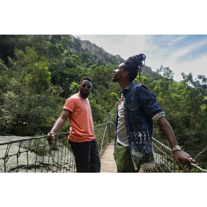 Family - Limpopo - Two men standing on bridge in forest